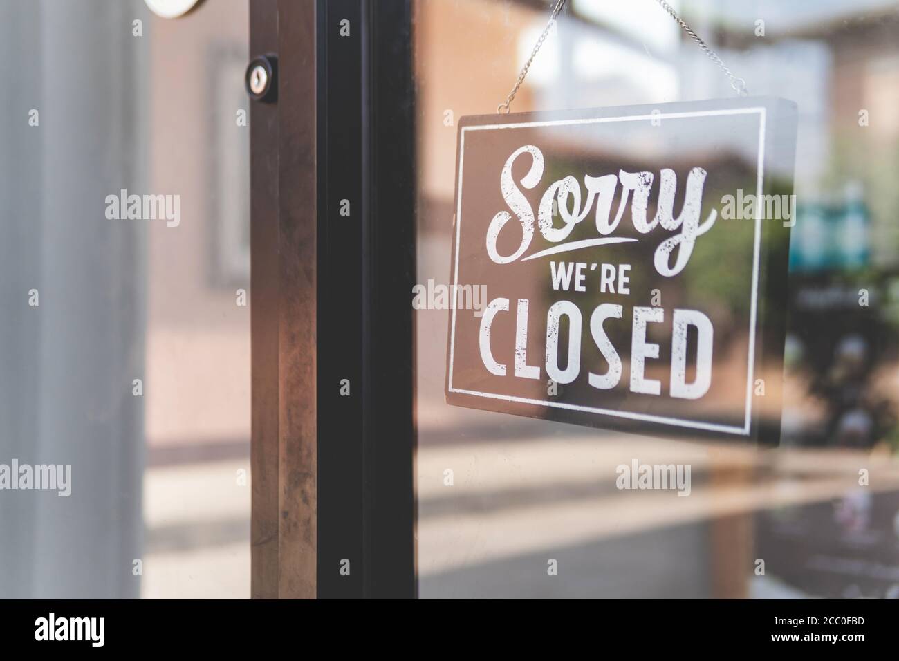Label 'Sorry we're closed' notice sign wood board hanging on door front ...
