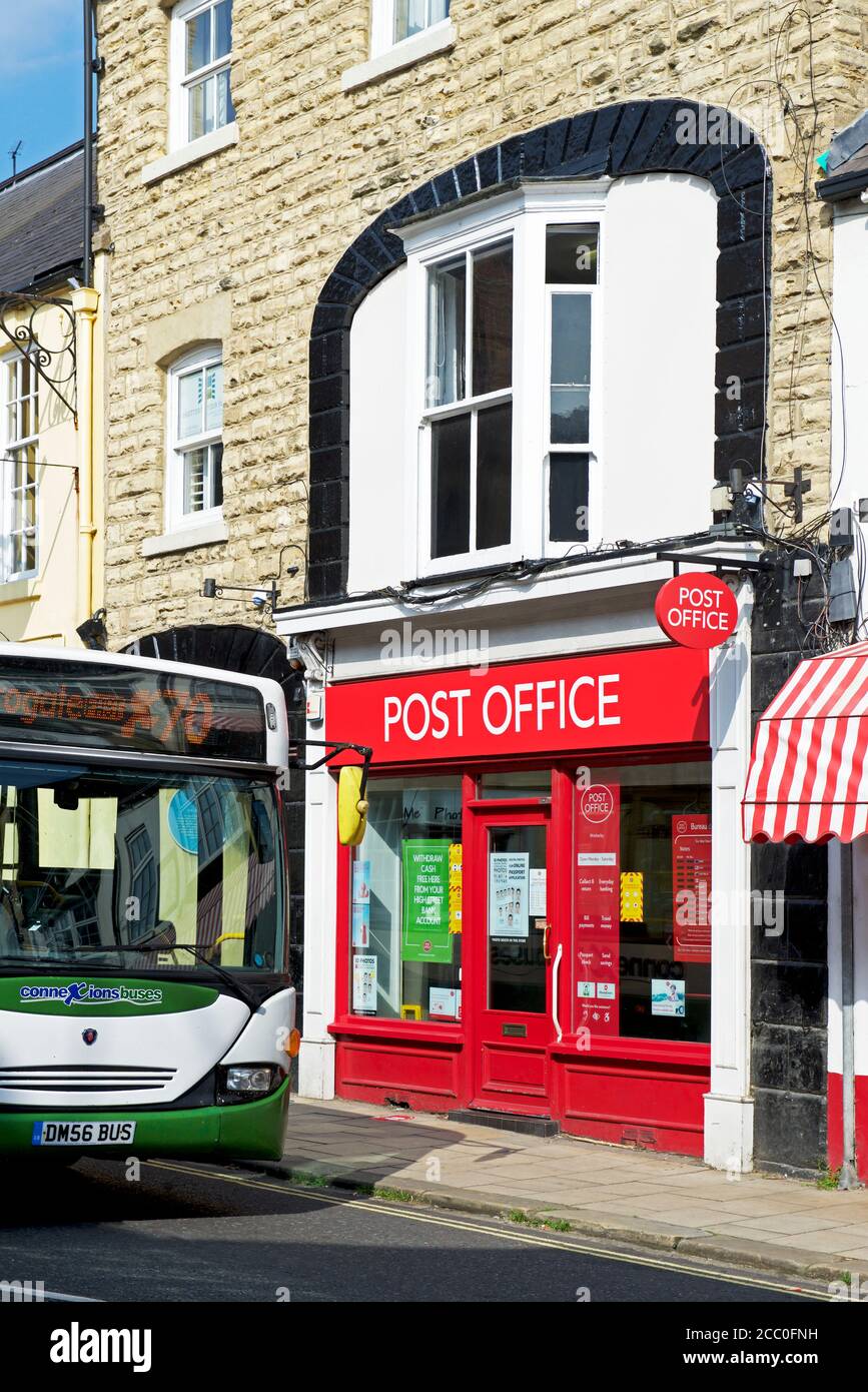 Bus passing the Post Office on High Street, Wetherby, West Yorkshire ...