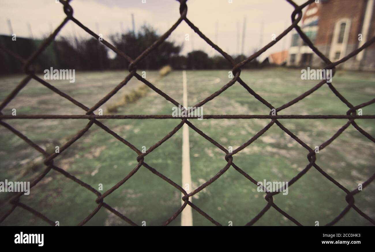 Mesh fence sports field hi-res stock photography and images - Alamy