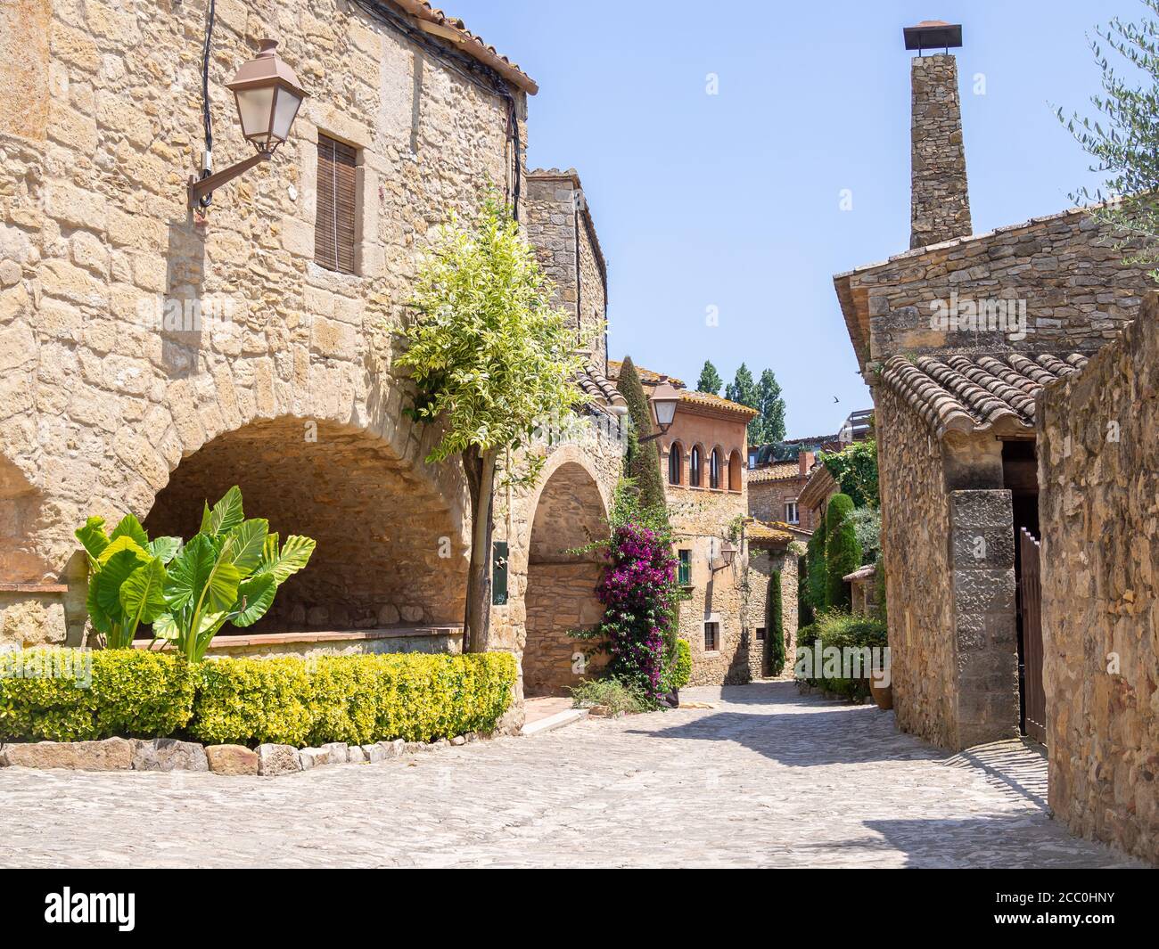 Medieval architecture street in Peratallada town in Catalonia, Spain ...