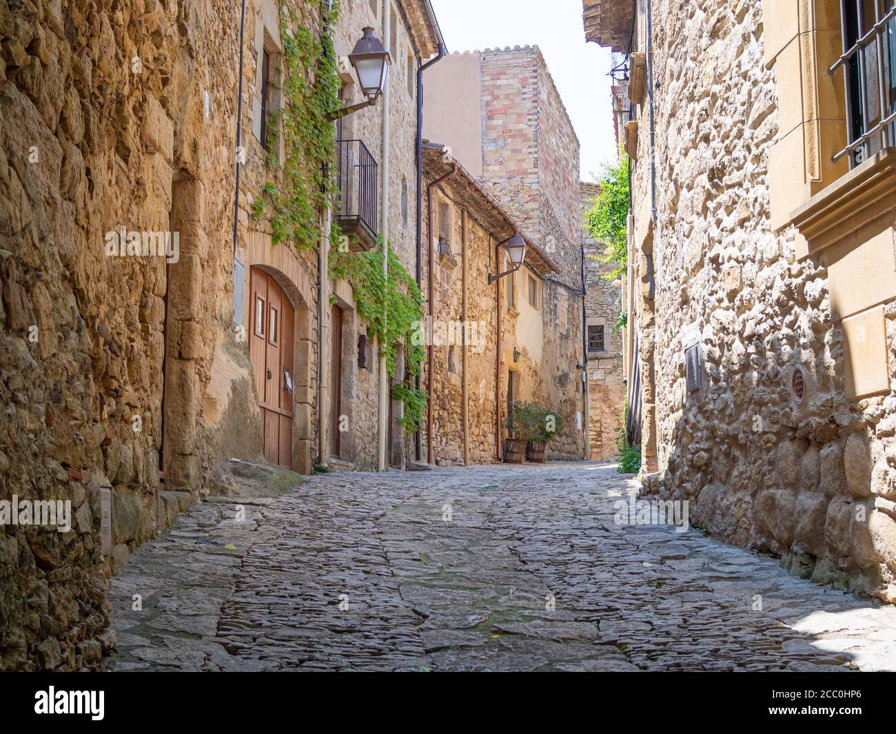 Medieval architecture street in Peratallada town in Catalonia, Spain ...