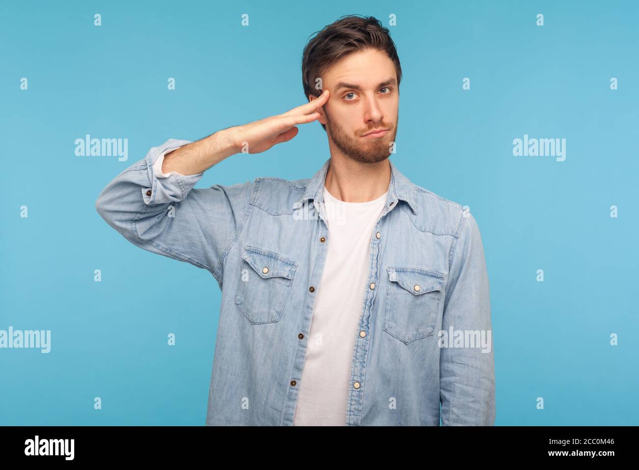 Yes sir! Portrait of responsible patriotic man in worker denim shirt ...