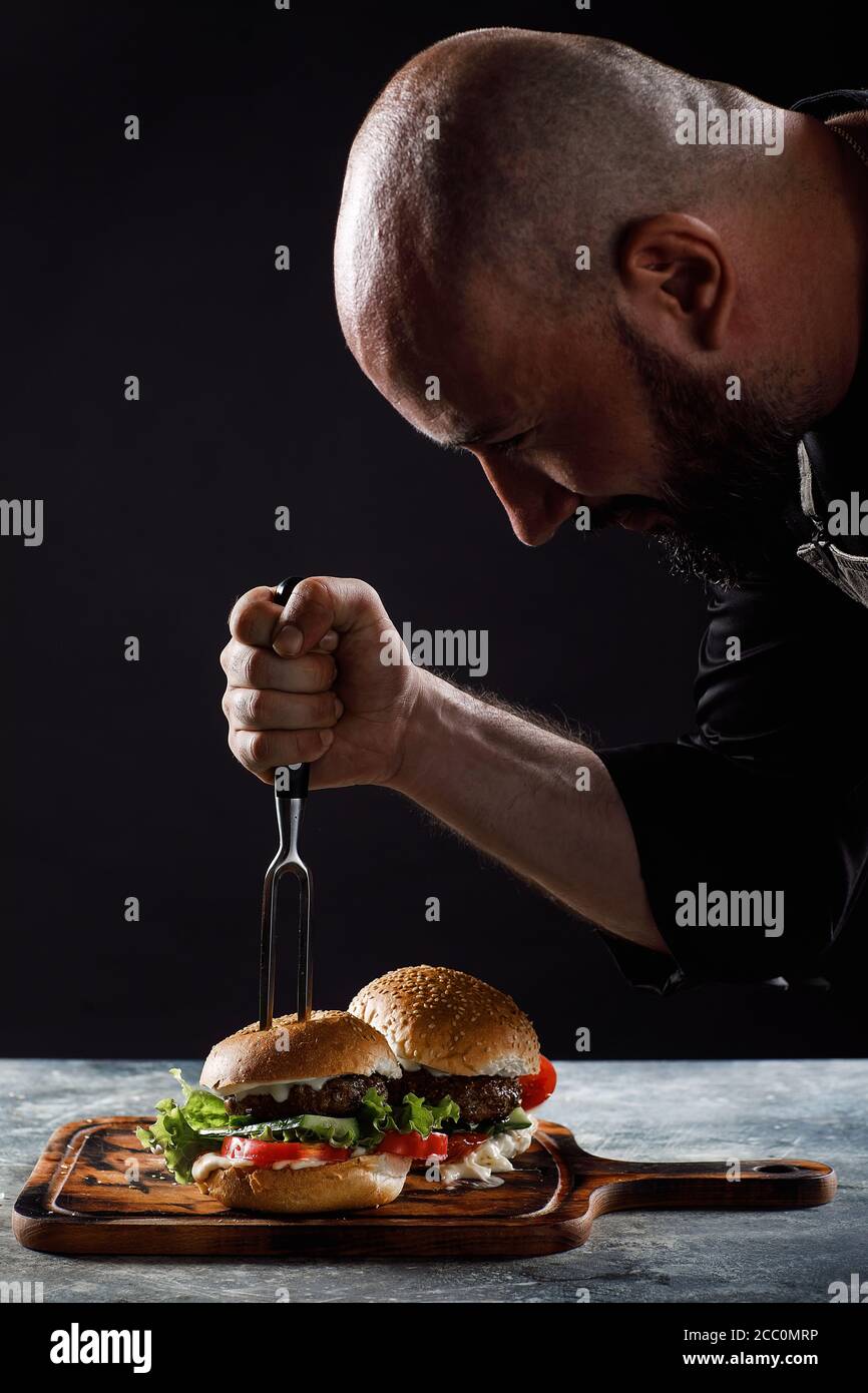 Cooking burgers close up chef hi-res stock photography and images - Alamy
