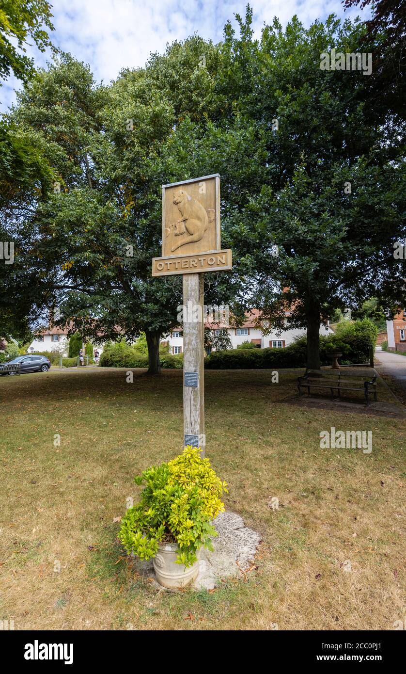 The village name sign in Otterton, a picturesque quaint small village ...