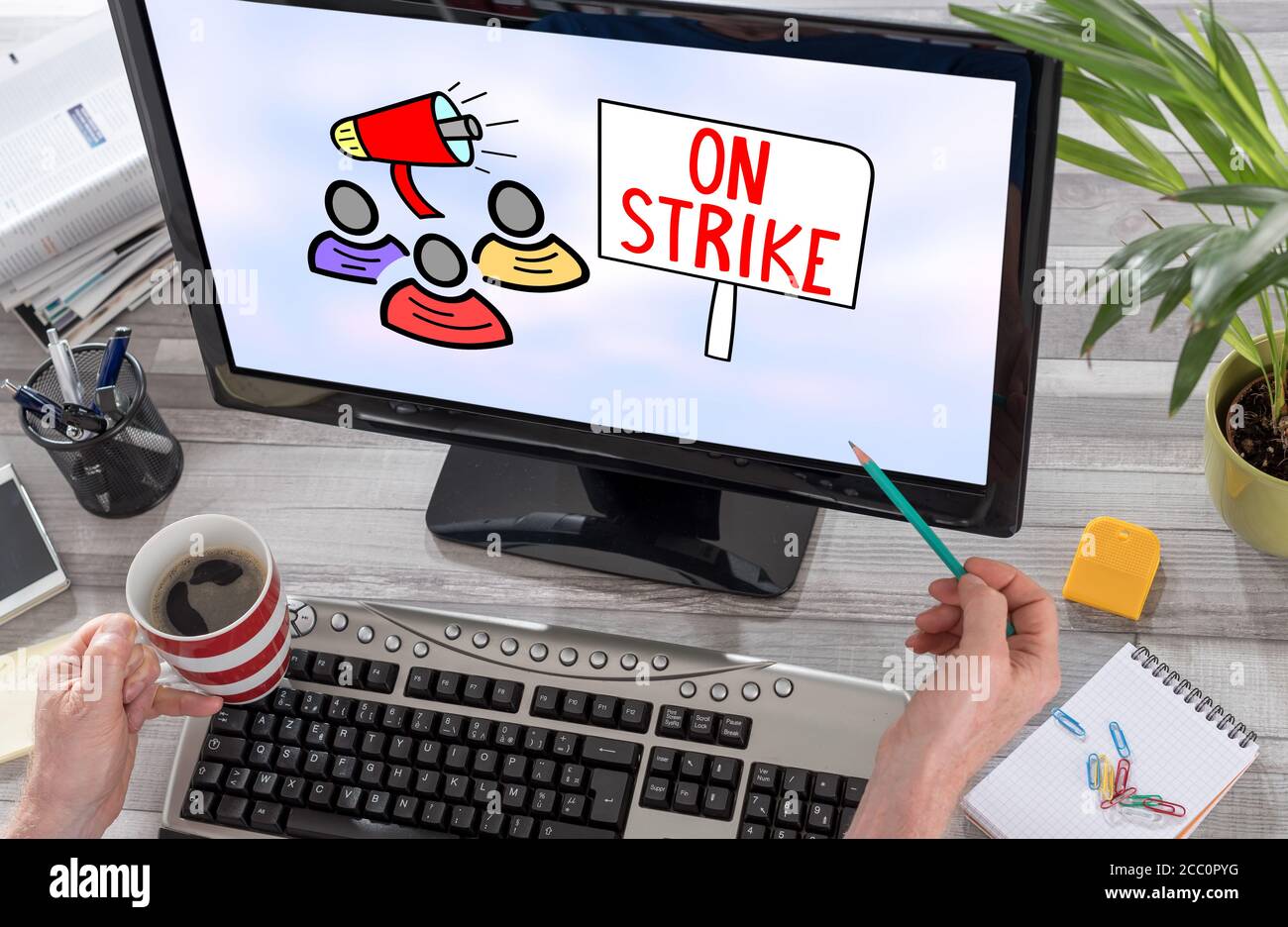 Hand megaphone computer screen hi-res stock photography and images - Alamy