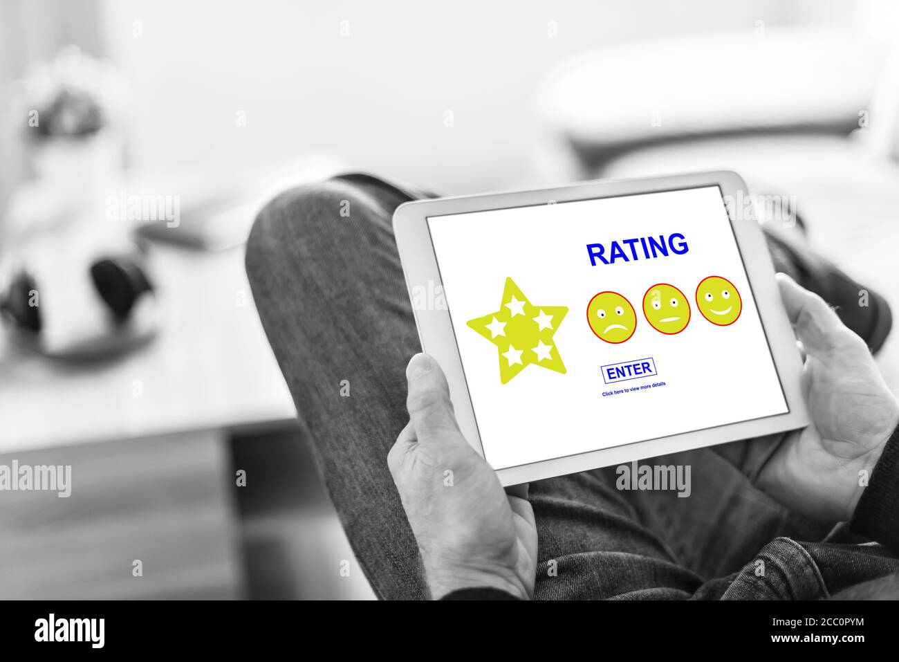 Tablet screen displaying a rating concept Stock Photo - Alamy