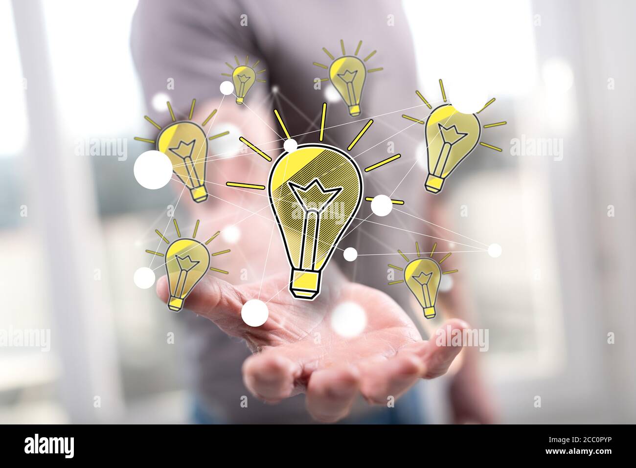 Innovation concept above the hand of a man in background Stock Photo ...