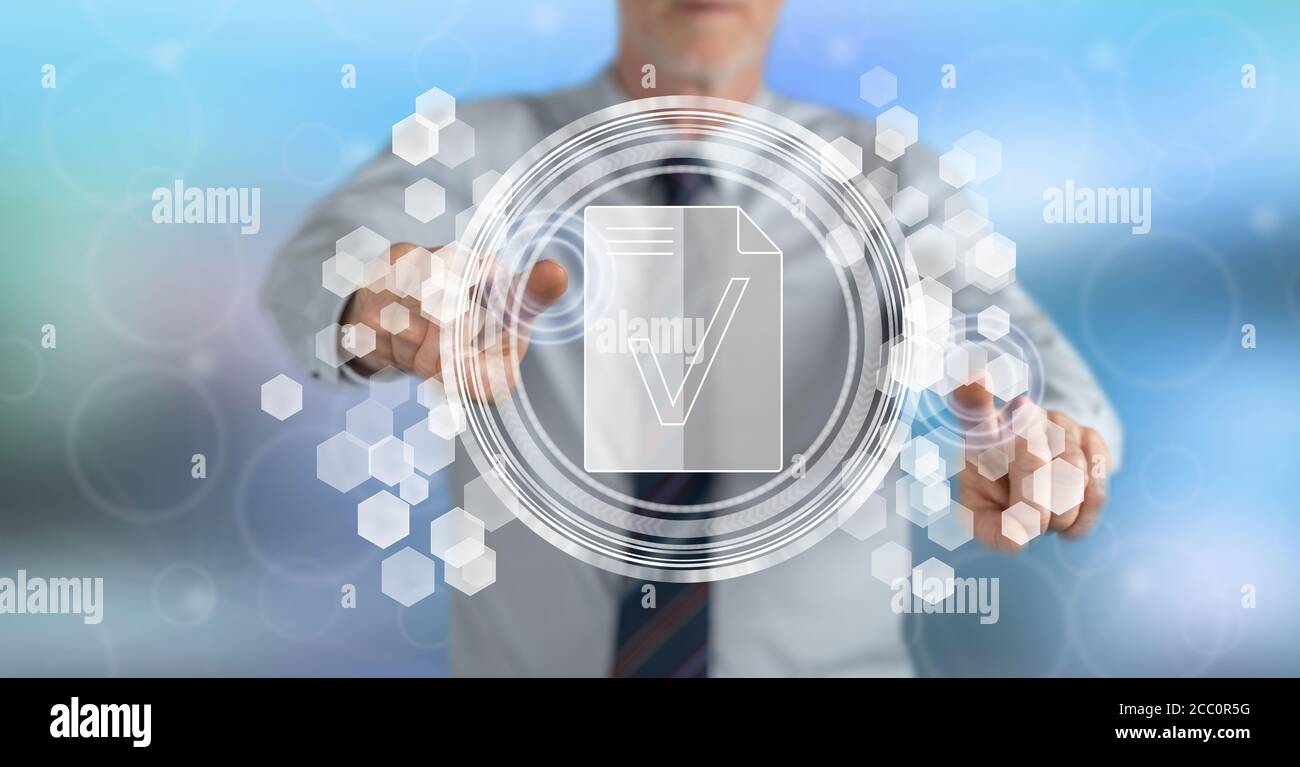 Man touching a document validation concept on a touch screen with his ...