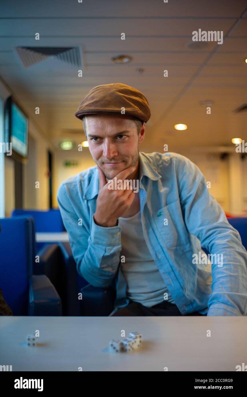 Male model with a tricky look as he's planning to do something Stock ...