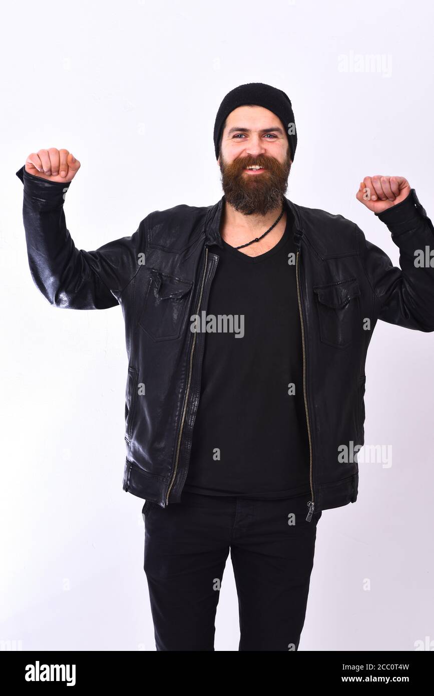 Street life style concept. Rock fan or gangster stretches muscles. Guy ...