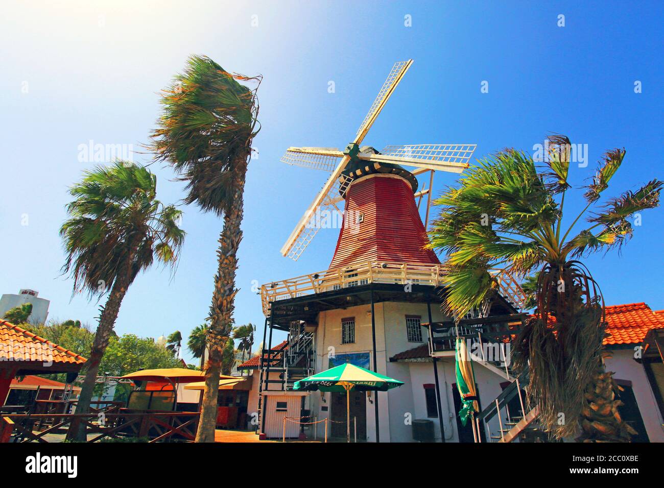 Dutch Antilles. Aruba. Old windmill. Palm Beach Stock Photo - Alamy
