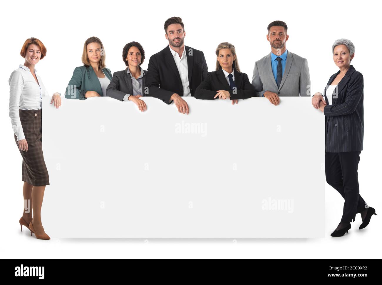 Business people group with blank banner isolated over white Stock Photo ...