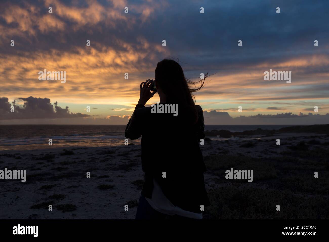 Woman selfie beach sunset hi-res stock photography and images - Alamy
