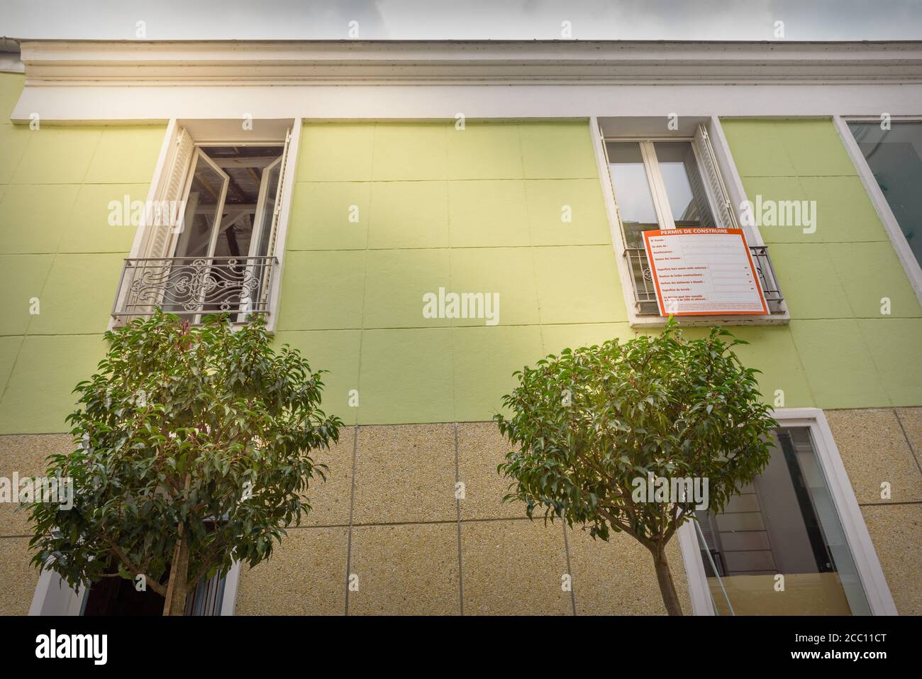 Front side of a little old individual house in a french city on ...