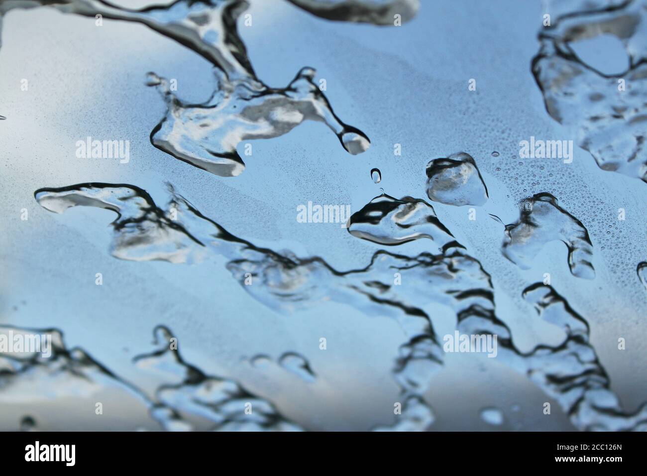 Closeup texture of water drops on a window glass Stock Photo - Alamy