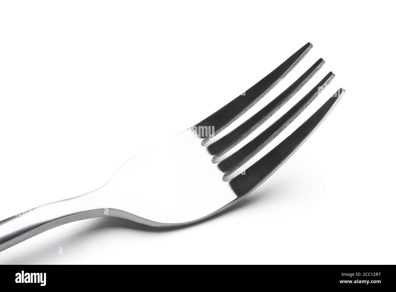 Steel fork isolated on a white background Stock Photo - Alamy