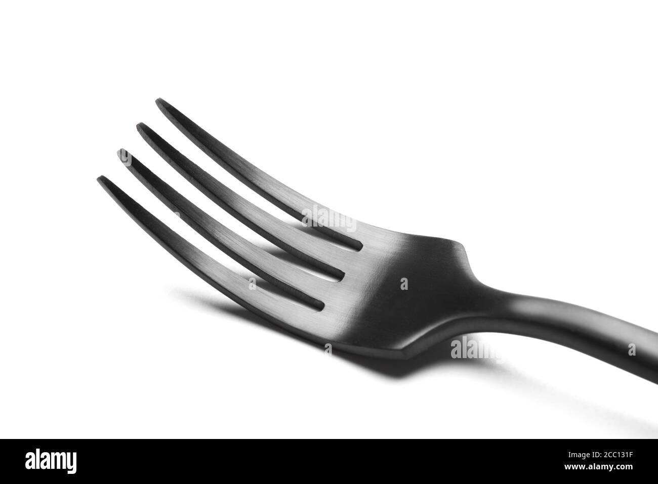 Black steel fork isolated on a white background Stock Photo - Alamy