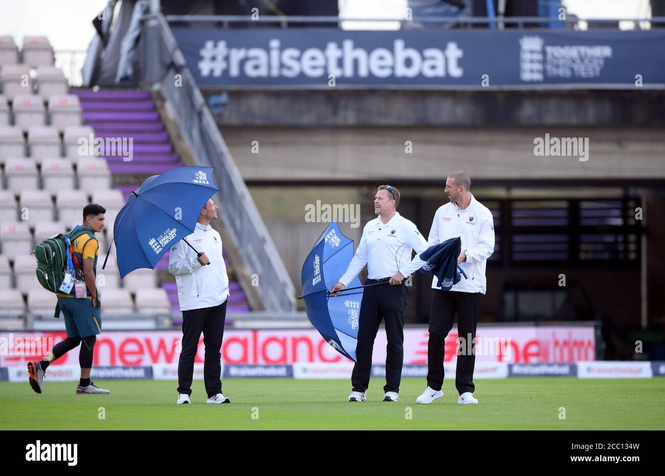 Umpires Richard Kettleborough, Martin Saggers and Michael Gough (left ...