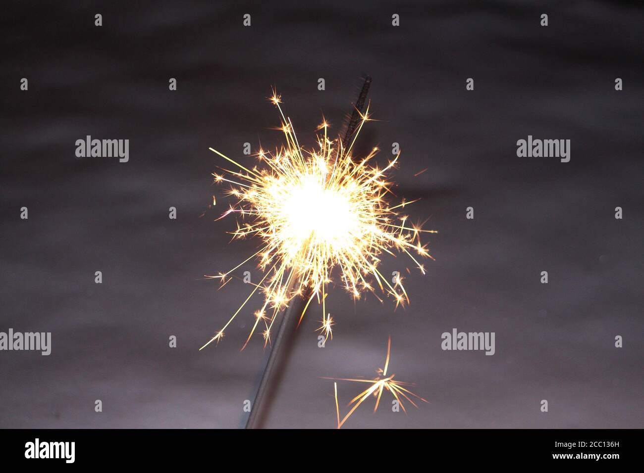 Closeup of burning bengal lights at night Stock Photo - Alamy
