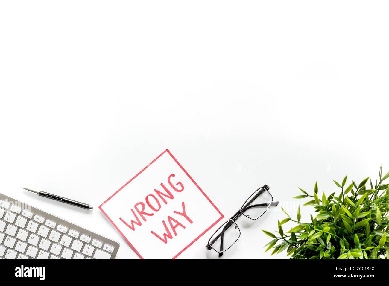 Wrong way icon on office desk - white, top view copy space Stock Photo ...
