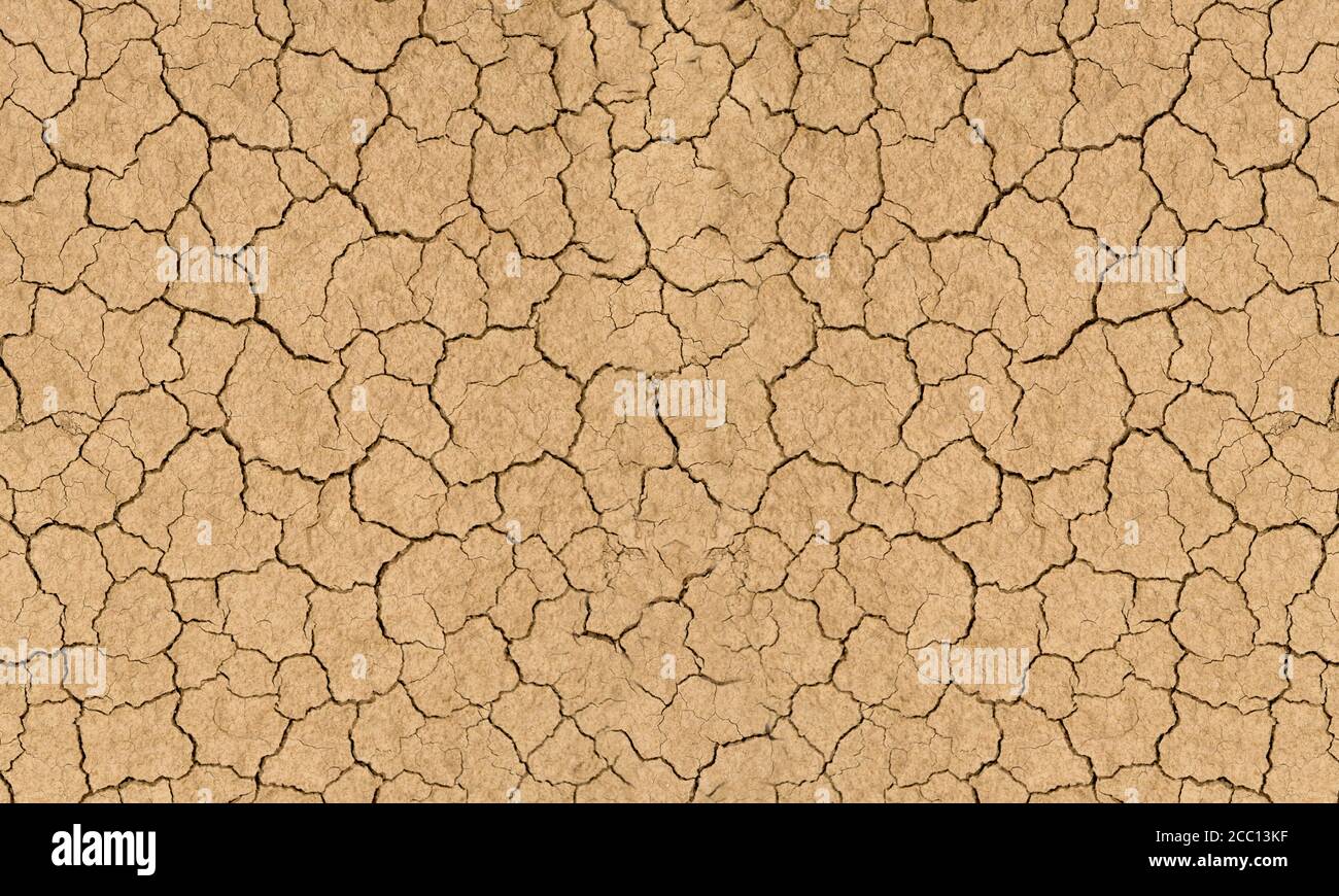 soil cracks clay earth dry desert Stock Photo - Alamy