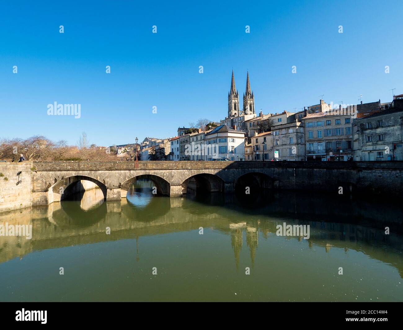 Cathedral reflecting in the river, Niort, France / Cathedral reflecting ...