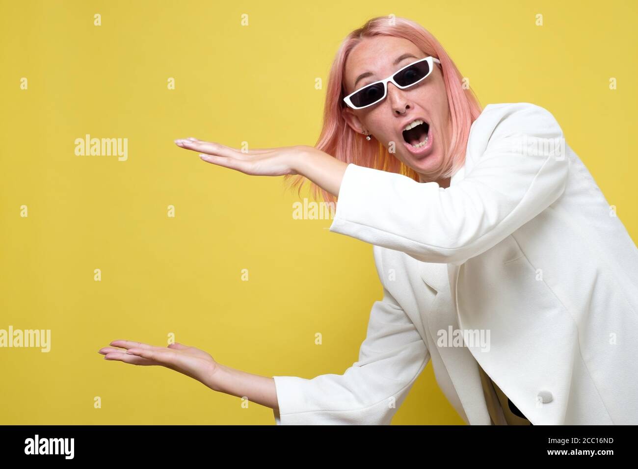 Showing large size hand gesture hi-res stock photography and images - Alamy