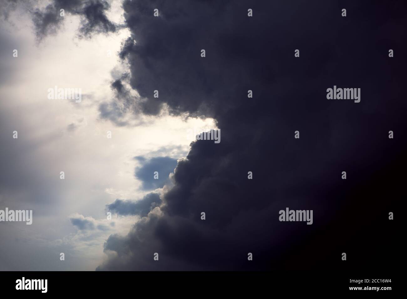 Apocalyptic black and bright heaven . Sky before storm Stock Photo - Alamy