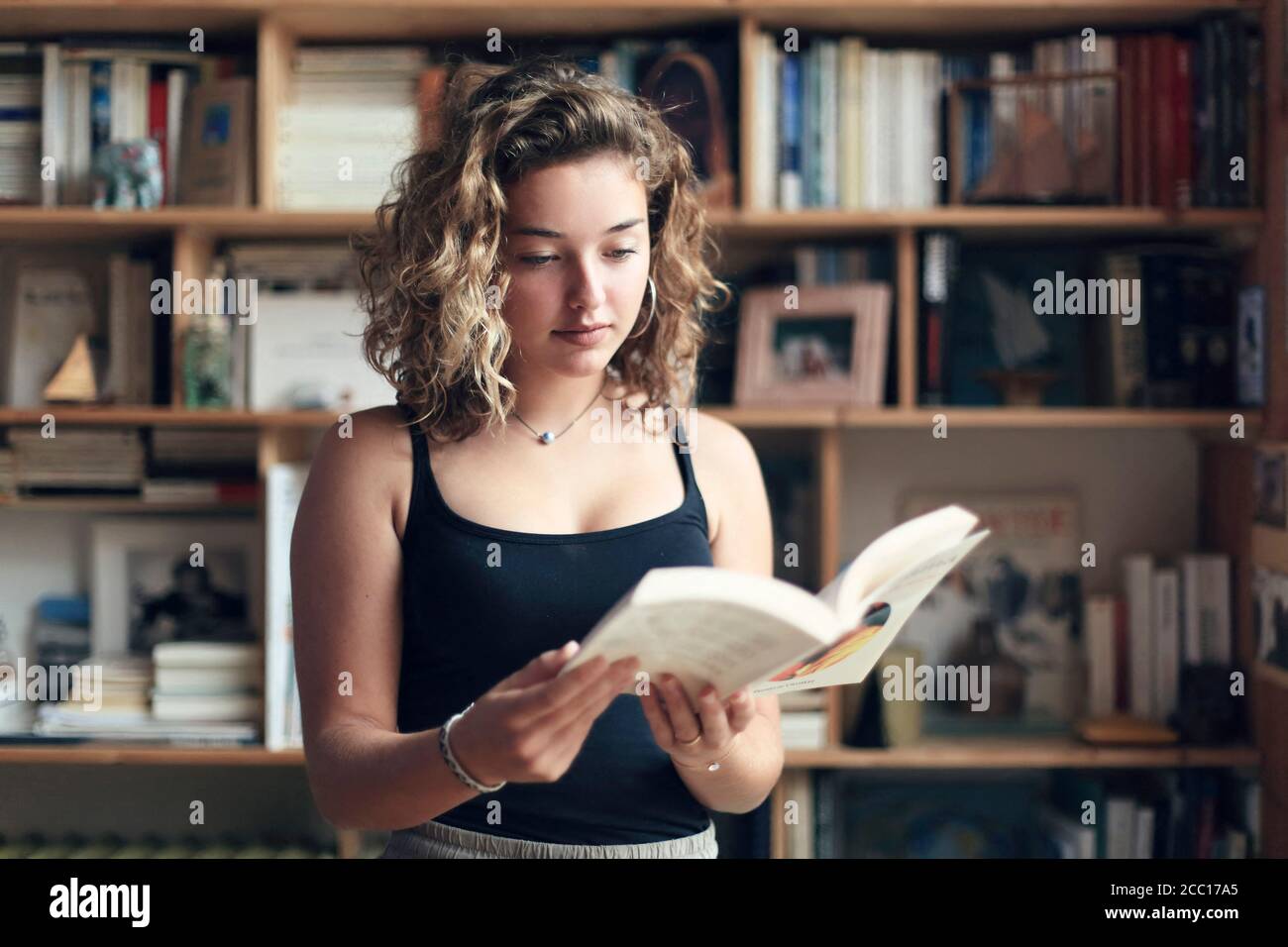 Teenage girl and everyday life. Reading Stock Photo - Alamy