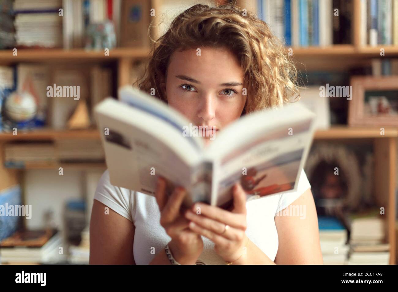 Teenage girl and everyday life. Reading Stock Photo - Alamy