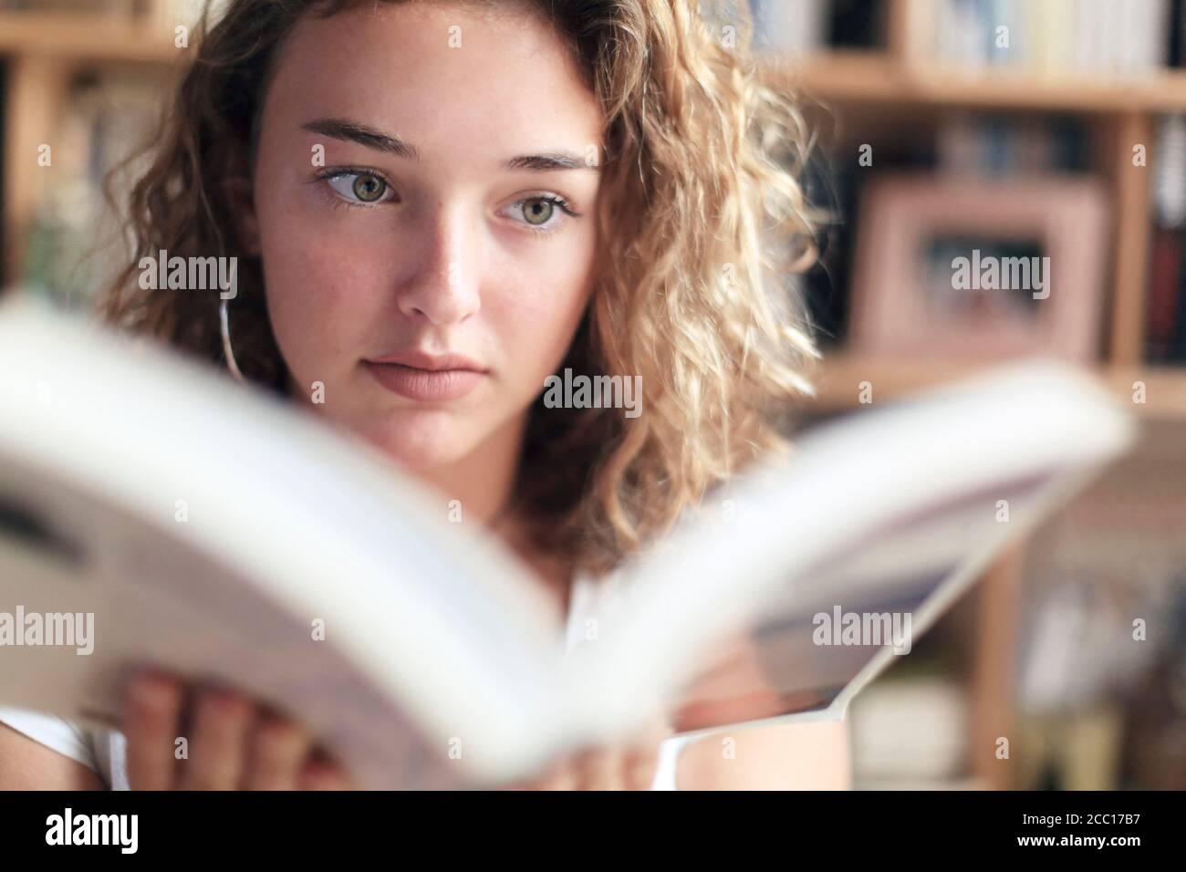 Teenage girl and everyday life. Reading Stock Photo - Alamy