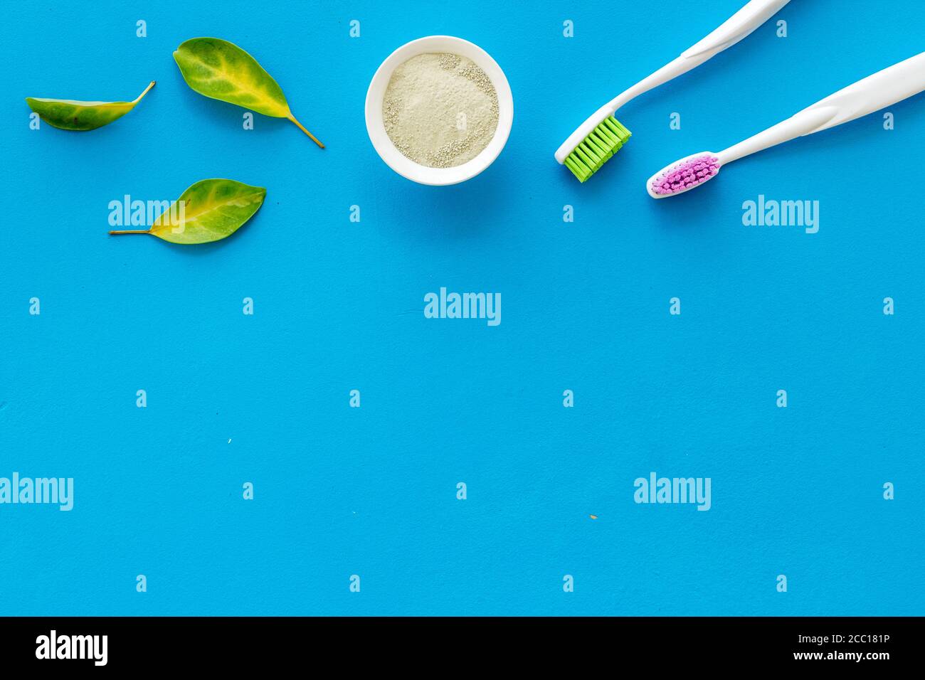 Herbal dental tooth powder with toothbrush. Organic health care concept ...