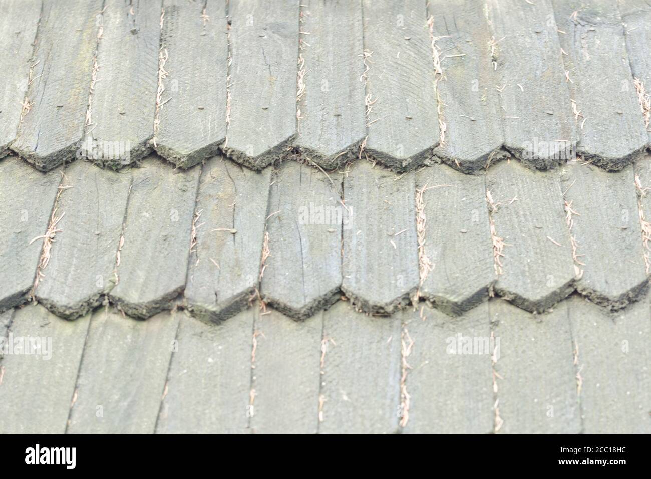 Old roof is made of wooden tiles. Texture. Close-up Stock Photo - Alamy