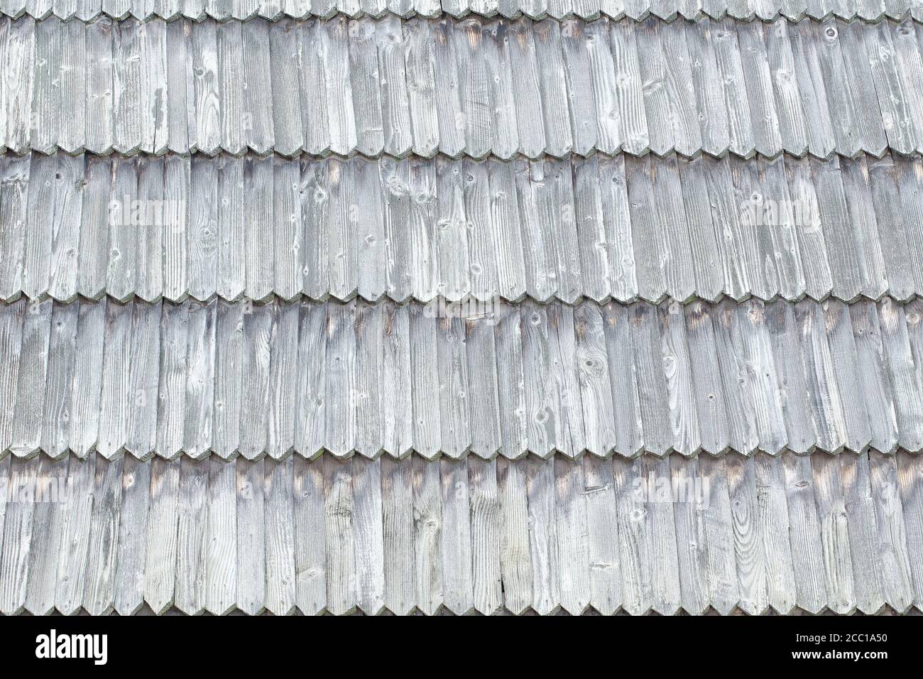 Old roof is made of wooden tiles. Texture. Close-up Stock Photo - Alamy