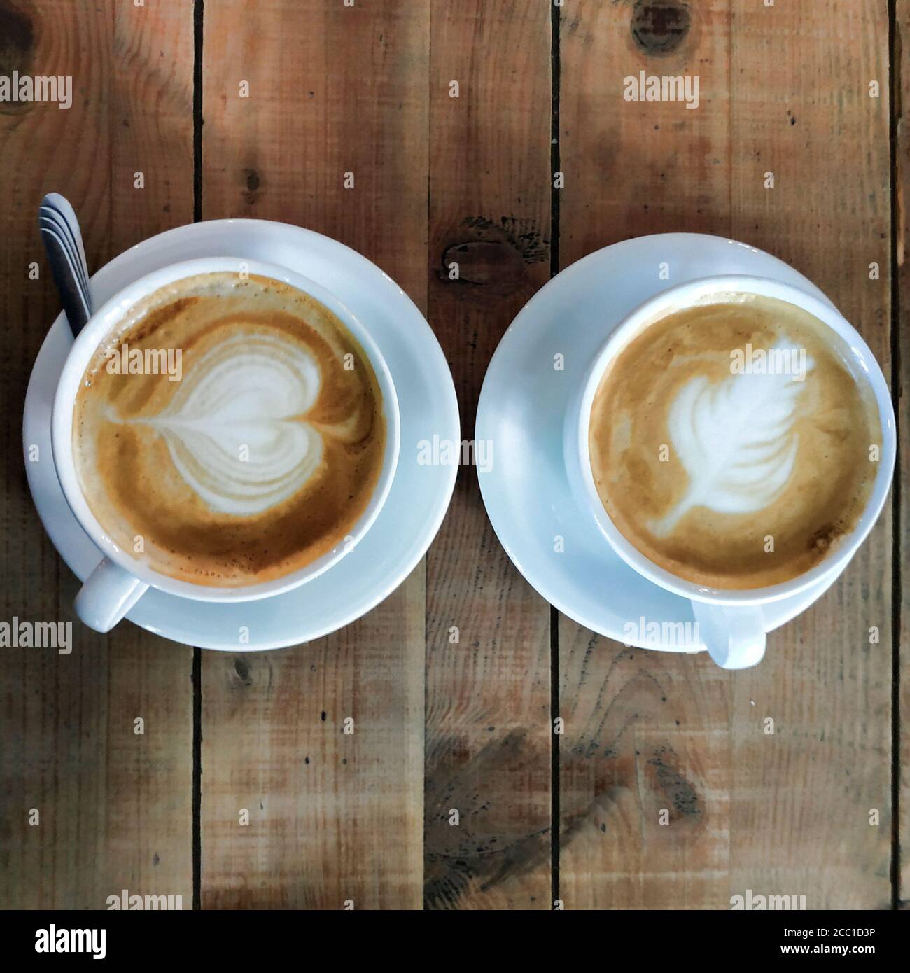 Two cups of cappuccino hi-res stock photography and images - Alamy
