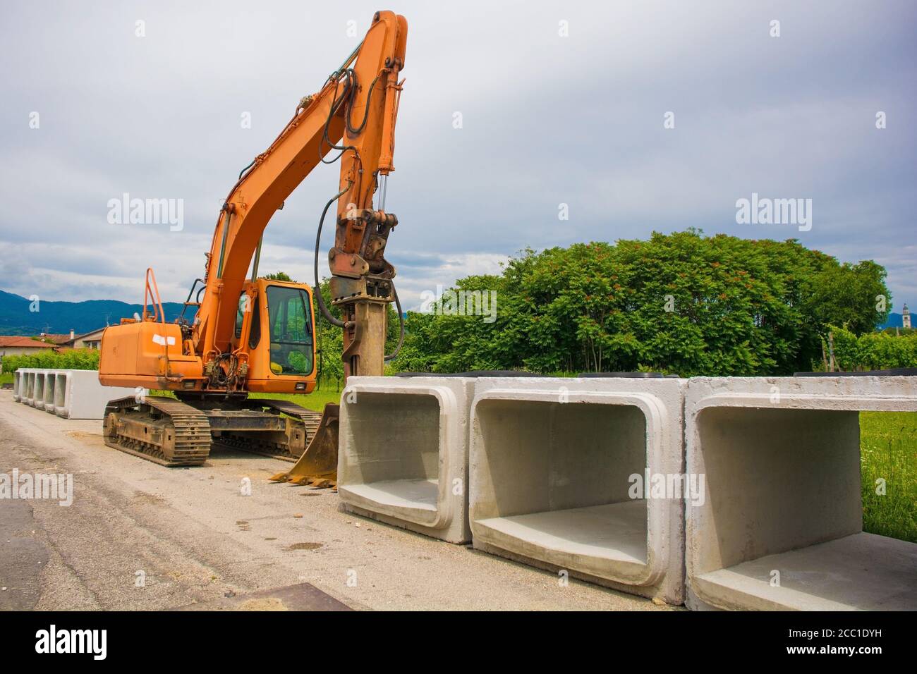 A crawler excavator with rotating house platform & continuous ...