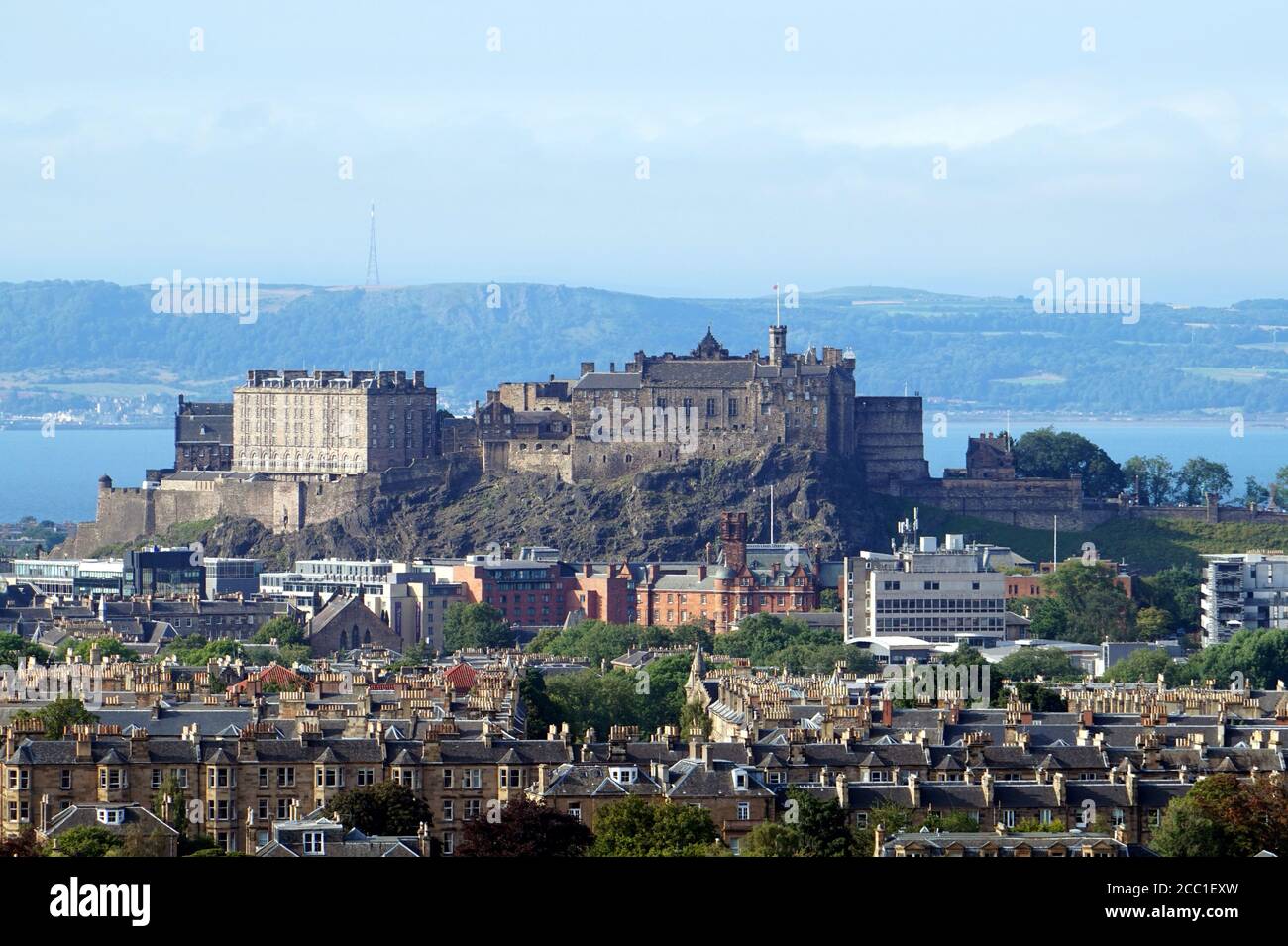 Edinburgh Castle in front of the Firth of Forth bay Stock Photo - Alamy