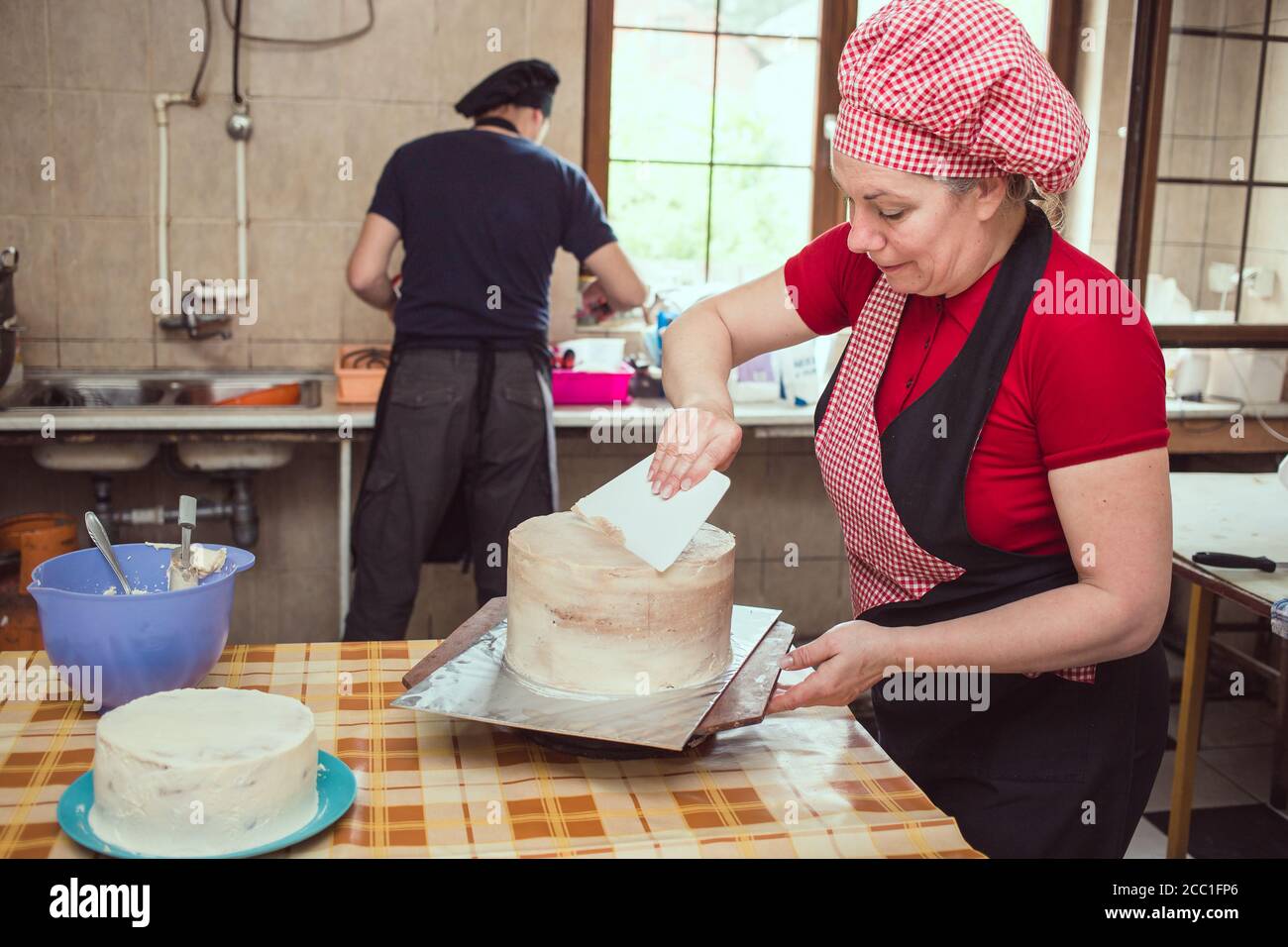 Female shop assistant uniform hi-res stock photography and images - Alamy