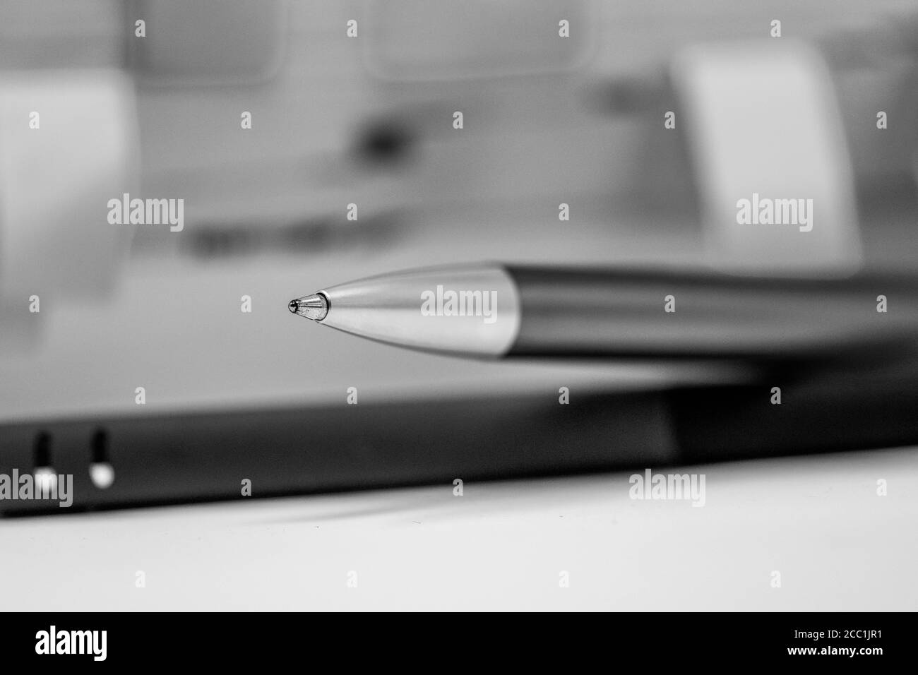 Grayscale shot of a pen Stock Photo - Alamy
