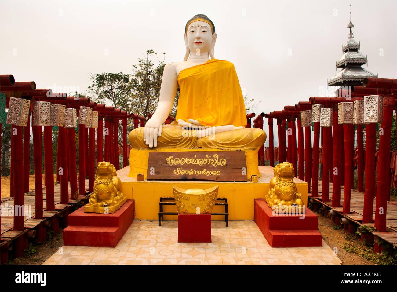 Big buddha statue and red Torii in Wat Phu Sa Ma temple with Su Tong ...