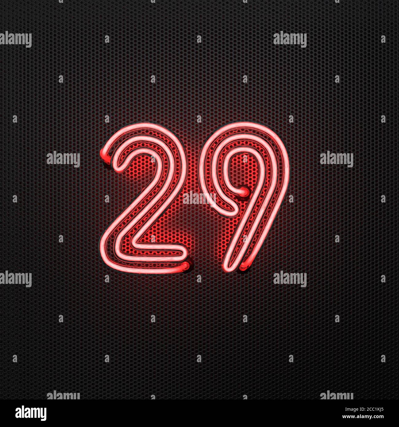 Glowing red neon number 29 (number twenty-nine) on a perforated metal ...