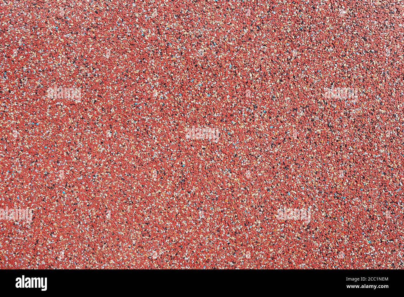 rubber cover with red and black rubber crumbs as background Stock Photo ...