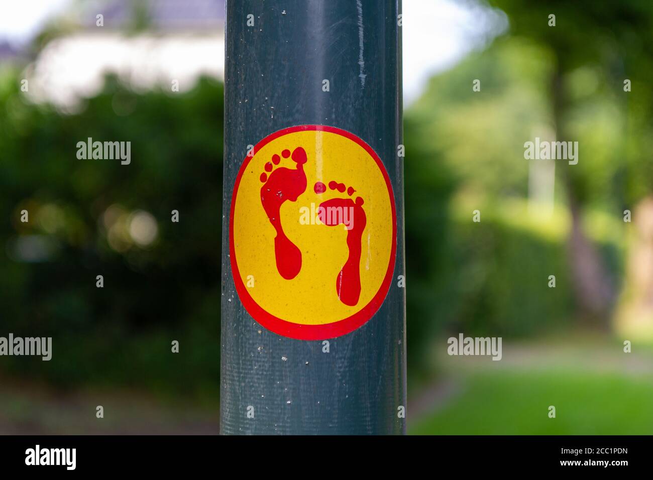 Sticker with red feet Stock Photo - Alamy