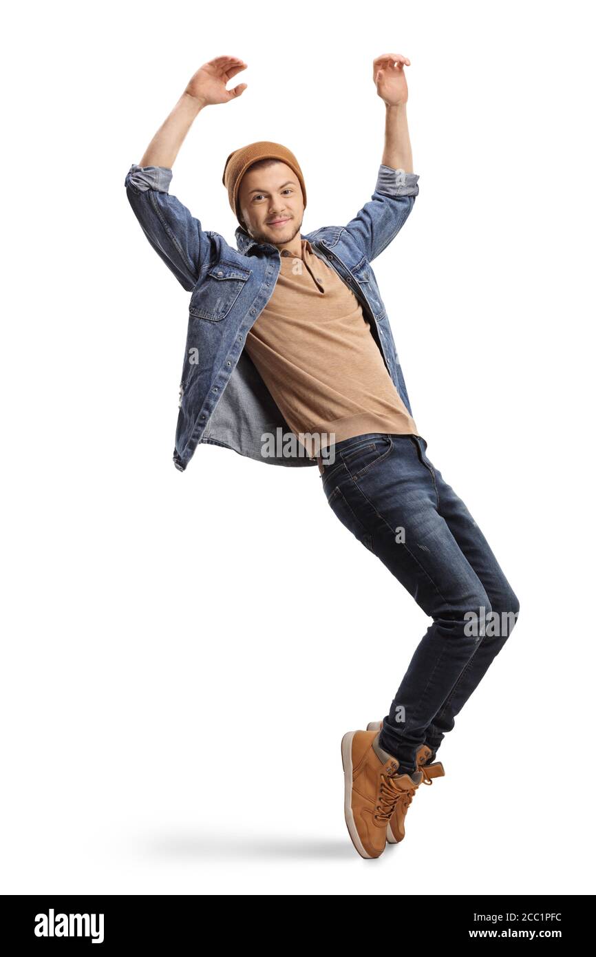 Guy in casual wear dancing and raising hands up isolated on white ...