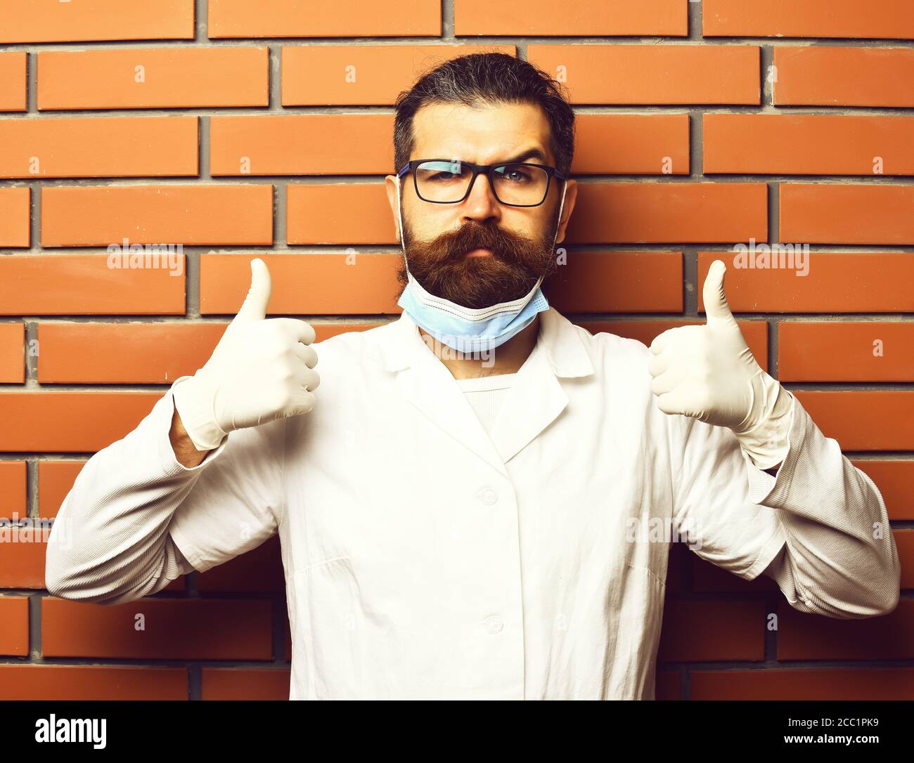 Bearded man, long beard. Brutal caucasian doctor or unshaven hipster ...