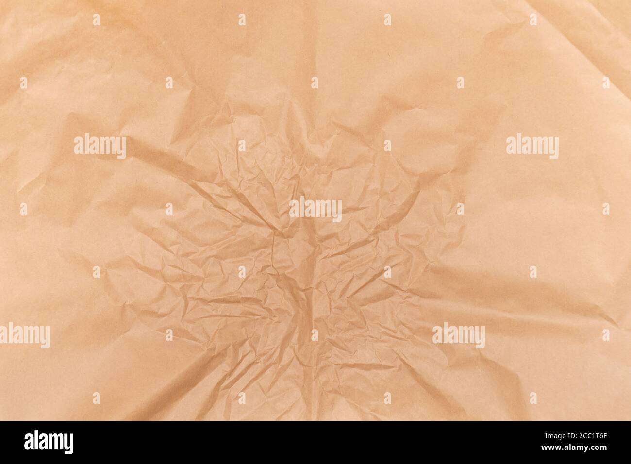 Closeup at crumpled paper parchment texture, sheet of used paper ...