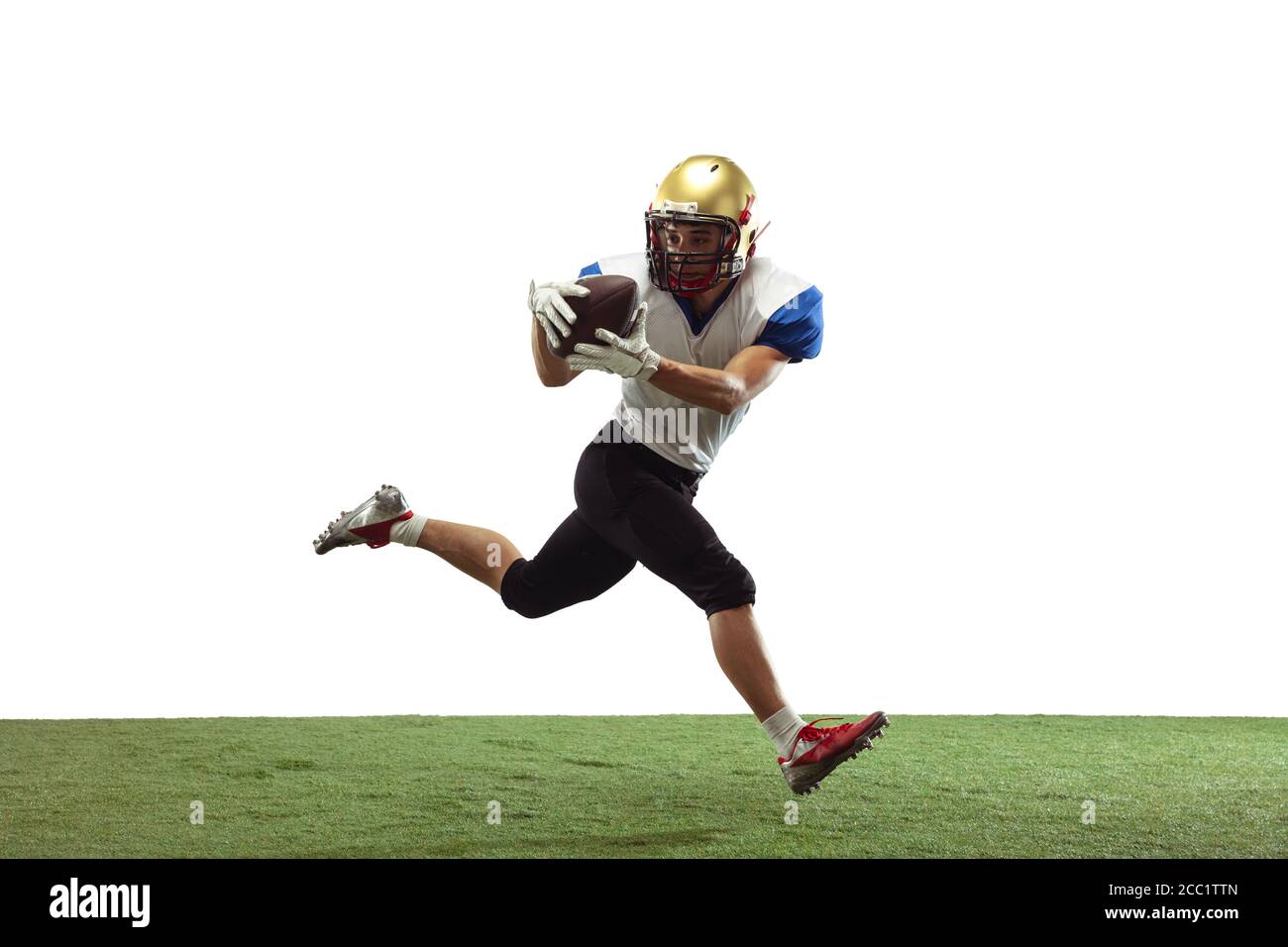 In action. American football player isolated on white studio background ...