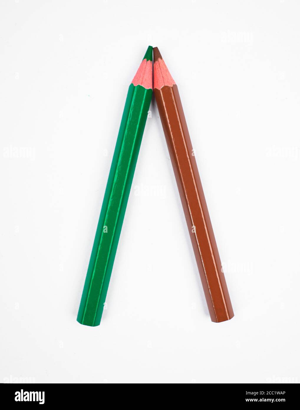Opposite V symbol made with some different colored wood pencil crayons ...