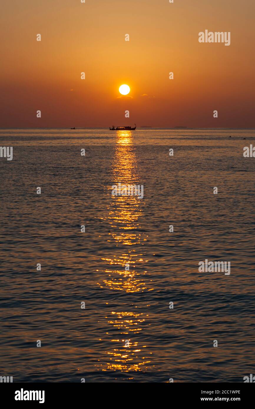 Asia, Sunset with fishing boat at Indian Ocean Stock Photo - Alamy