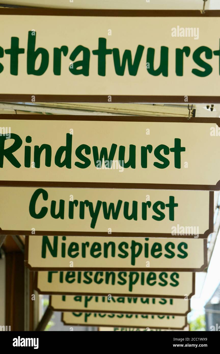 Food stall with signs Stock Photo - Alamy